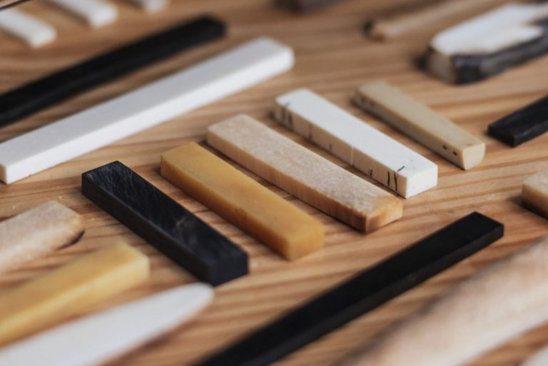 Best Guitar Nut & Saddle Materials & How To Choose